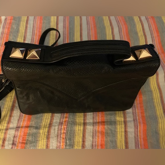 Linea Pelle | Bags | Linea Pelle Black Leather Purse With Goldtone ...